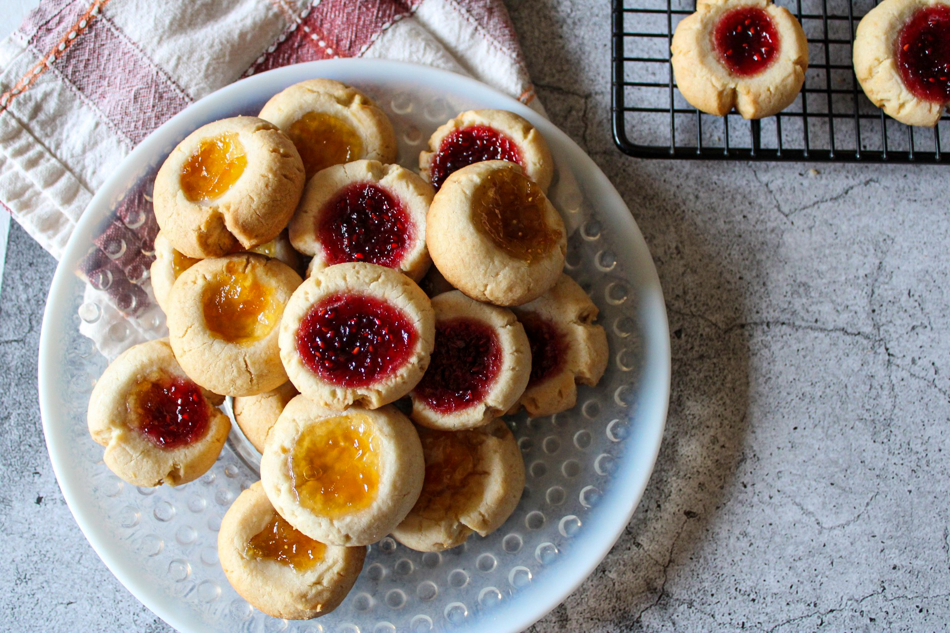 Holiday Jam Thumbprint Cookies | Crisp and Crumble